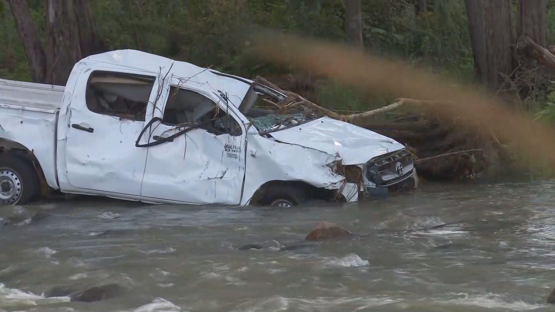Search underway after vehicle swept into floodwaters in northern NSW ...